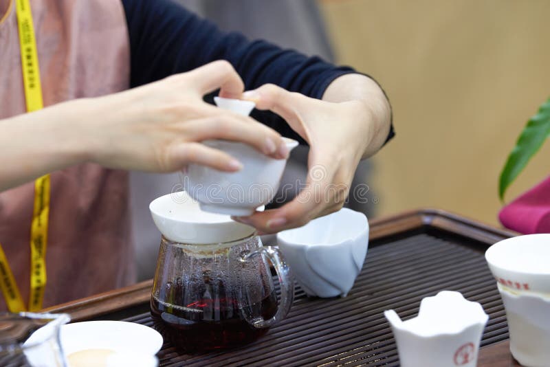 A Tea Sommelier is Making Tea for a Customer Stock Photo - Image of ...
