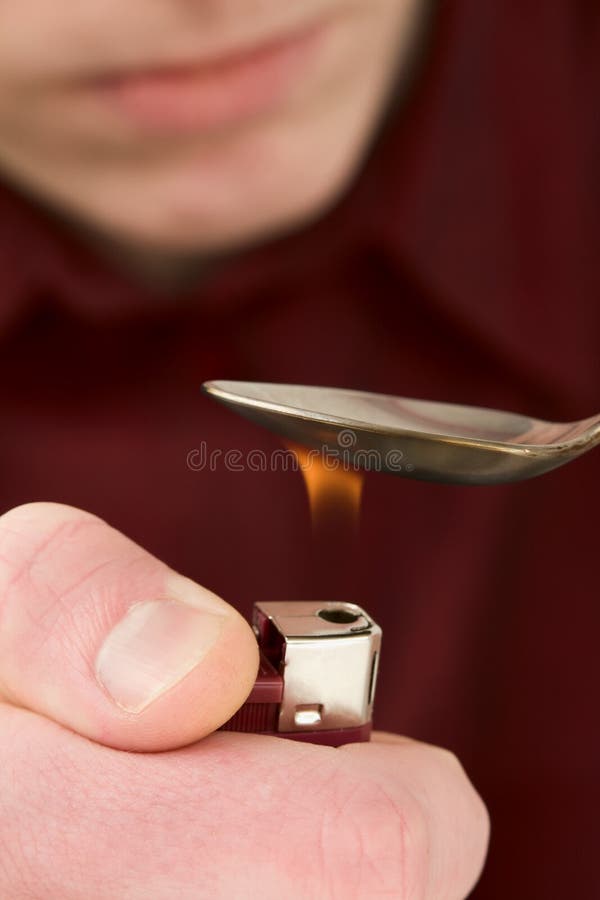 Tea-spoon and lighter stock photo. Image of vinous, male - 8251720