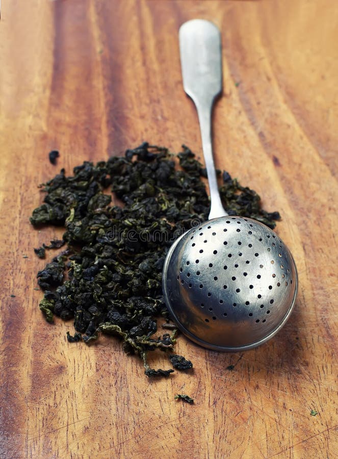 Tea Strainer with Green Tea Stock Image - Image of wooden, strainer ...