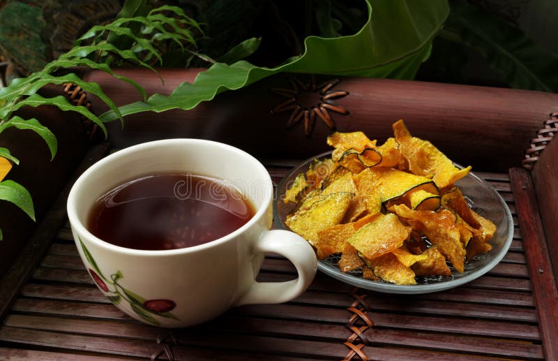 Tea and Sweet Pumpkin Cracker Front View Stock Photo - Image of chip ...