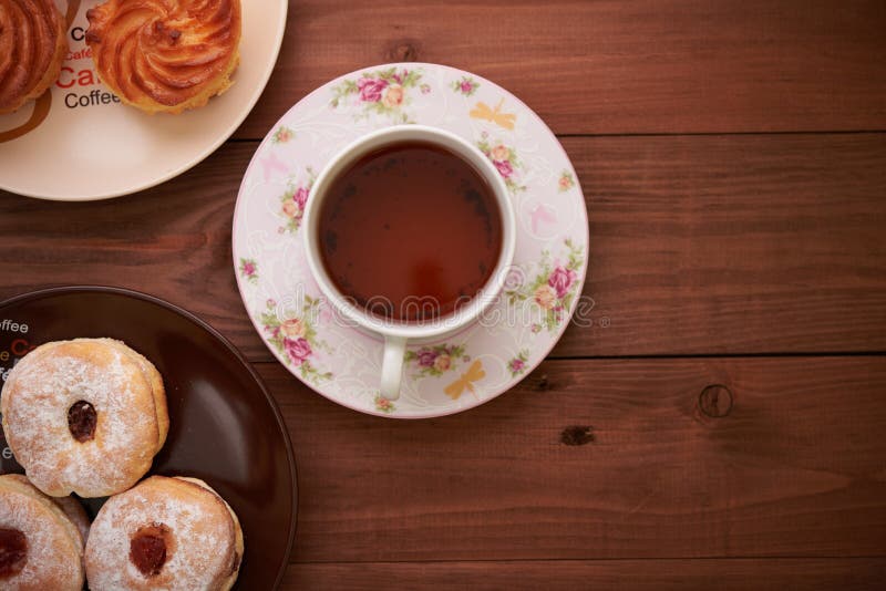 Tea and Sweets on a Wooden Table Stock Photo - Image of muffin, meal ...