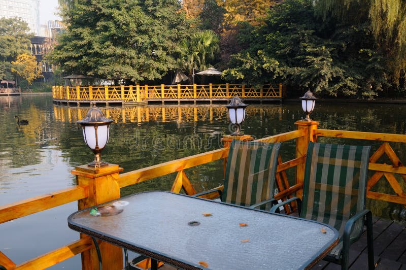 Tea Table and Chairs by Water Stock Image - Image of lake, chengdu ...