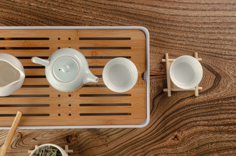 The Tea Table with Instruments Teapots Cups and Green Tea Stock Photo ...