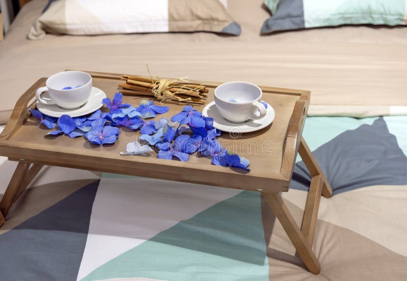 Tea Table with White Cups and Blue Petals Stock Photo - Image of retro ...
