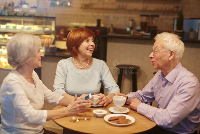 Tea-time in cafe stock image. Image of group, senior - 87444595
