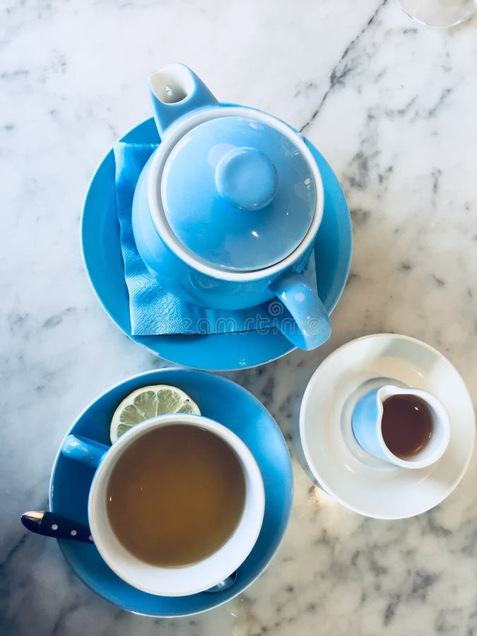 Tea time stock image. Image of clock, cups, lemon, cafe - 145938215