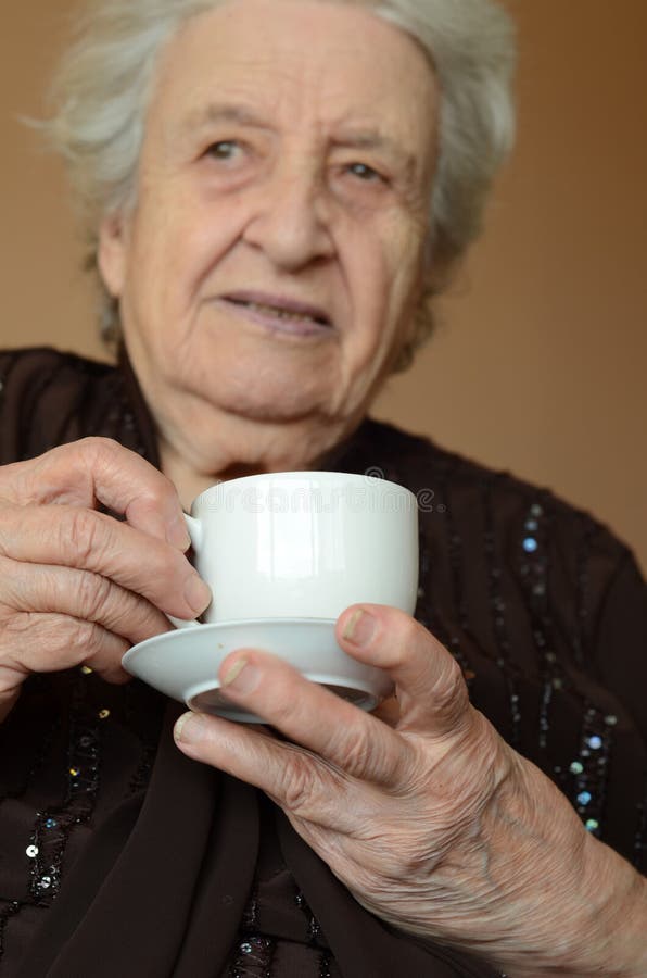 Tea Time for a Senior Woman Stock Image - Image of living, beverage ...