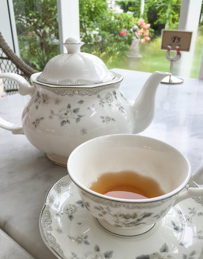 A Tea Time Table Settings in a Orchid Observatory Stock Image - Image ...