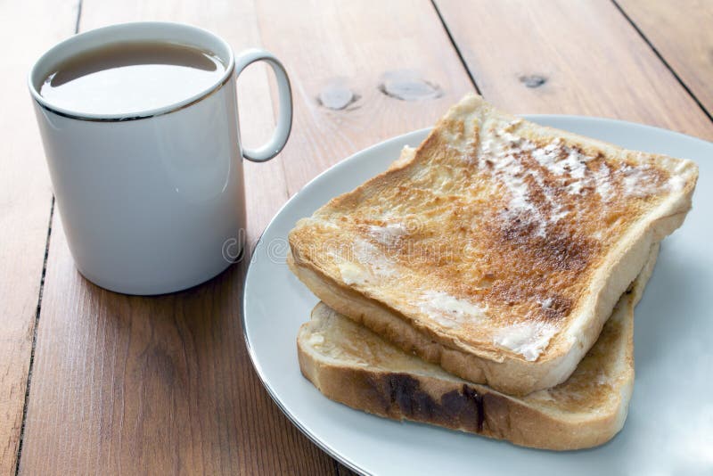 Tea and Toast on Wooden Table Stock Image - Image of breakfast, white ...