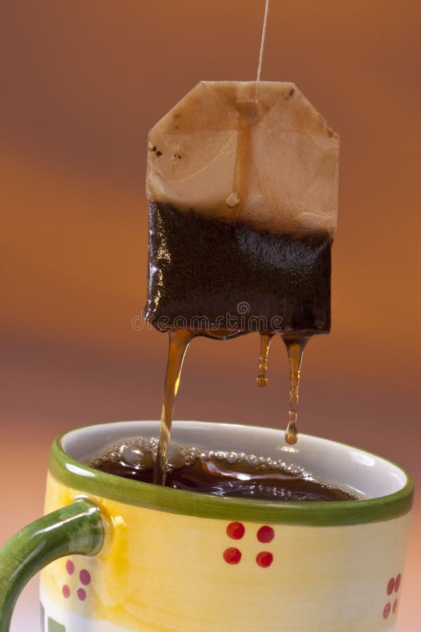 Tea - Using a Teabag stock photo. Image of teabags, droplet - 21967932