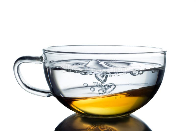 Tea and Water in Glass Cup Isolated on White Stock Photo - Image of ...