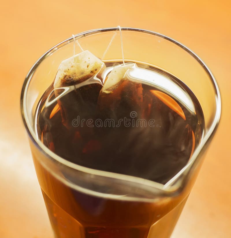 Teabag Filter Soak in Hot Water Stock Photo - Image of steel, liquid ...