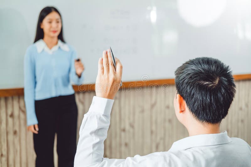 Teacher Addressing University Students in a Classroom Stock Photo ...