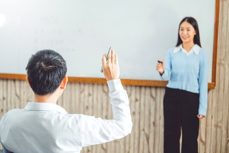 Teacher Addressing University Students in a Classroom Stock Photo ...