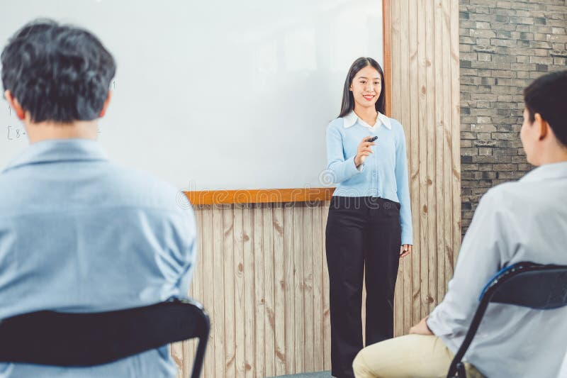 Teacher Addressing University Students in a Classroom Stock Image ...