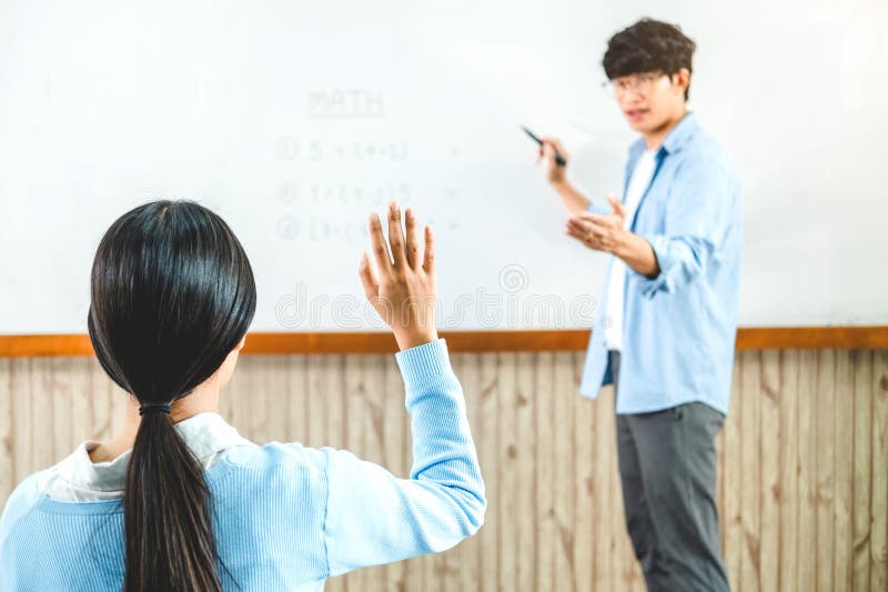 Teacher Addressing University Students in a Classroom Stock Photo ...