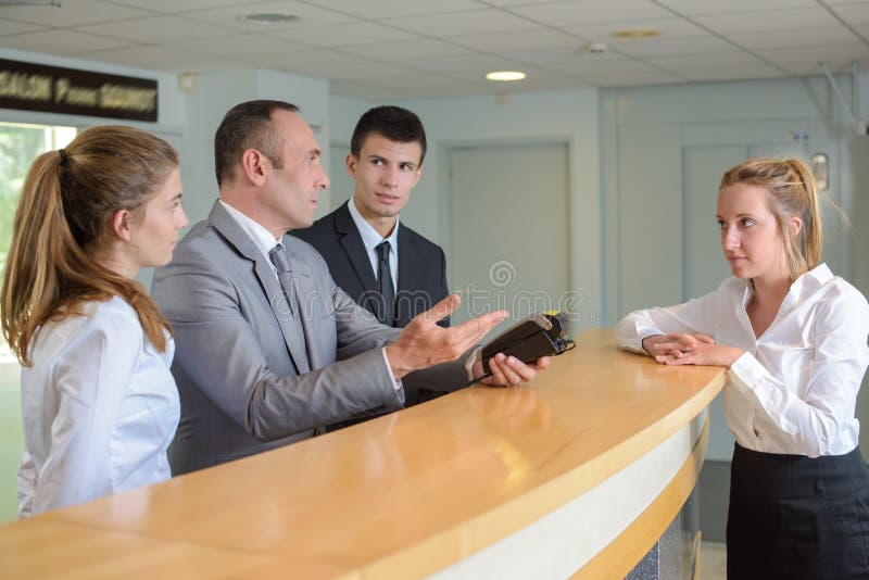 Teacher and Apprentices Receptionist Training Stock Image - Image of ...