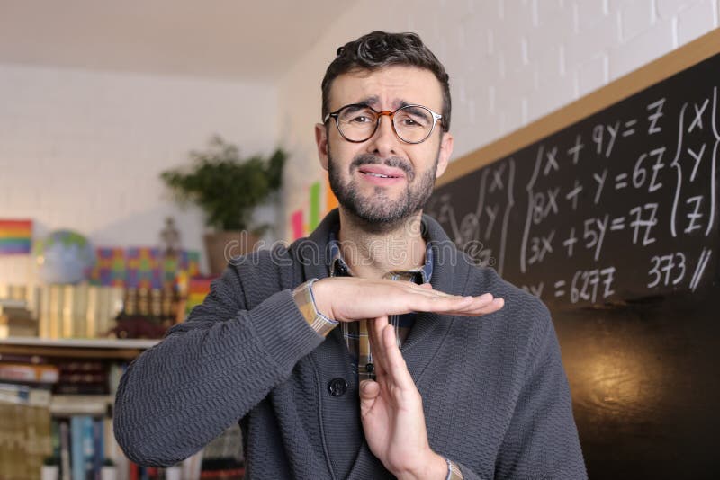 Teacher Asking for a Break with Time-out Hand Gesture Stock Photo ...