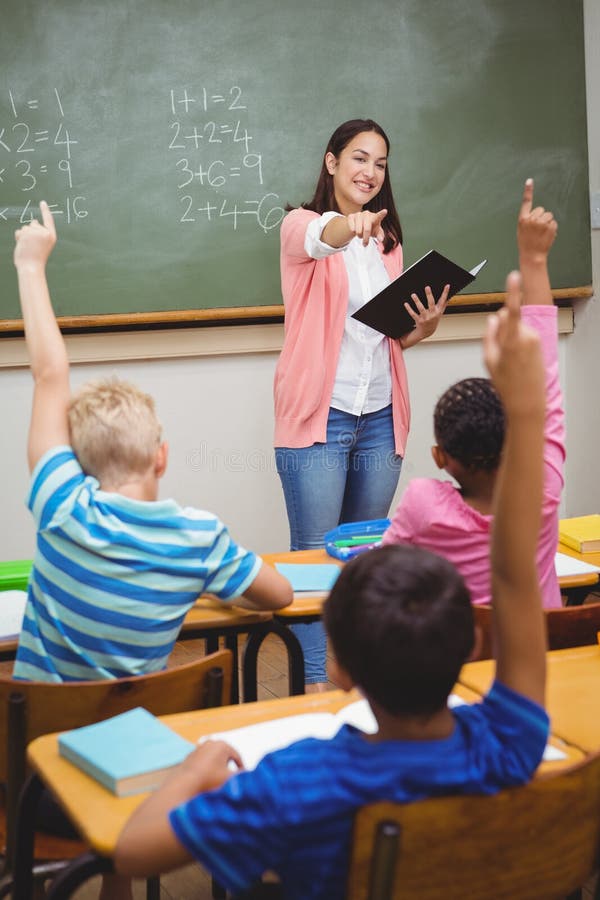 Teacher Asking Her Students a Question Stock Image - Image of child ...