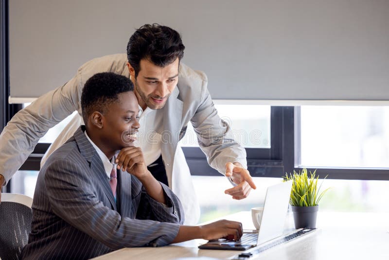 Black Man Working at Programmable Machine in Factory Industries Stock ...