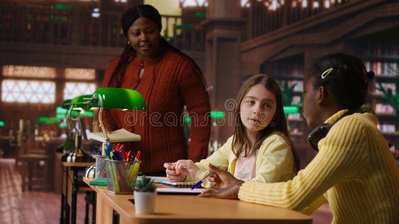 Teacher Assisting Scholars with Class Homework for Mentoring Session ...