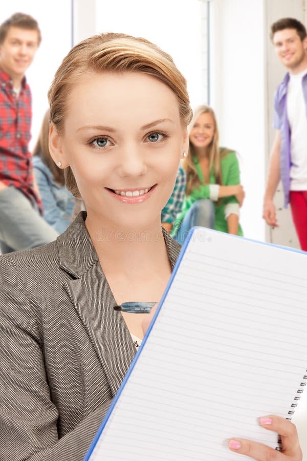 Teacher with Big Notepad at School Stock Image - Image of notebook ...
