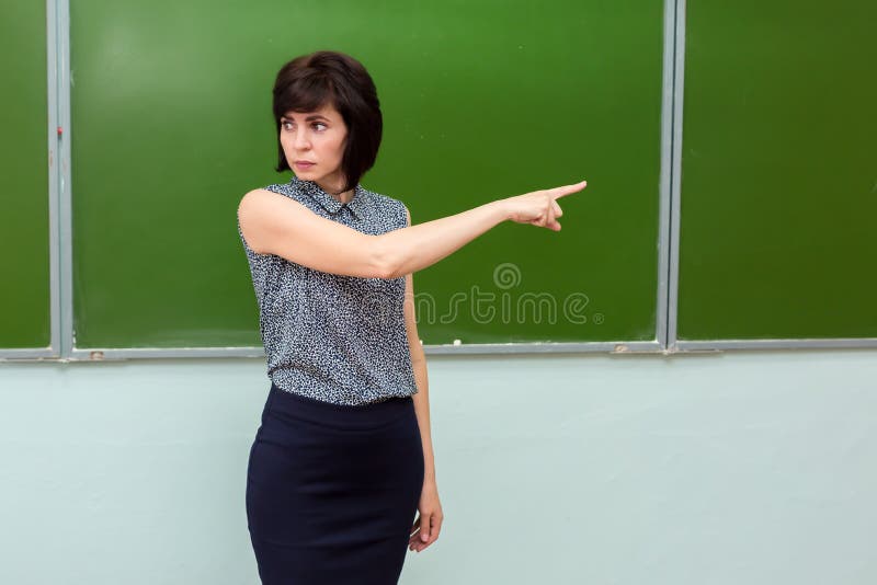 The Teacher Scolds Student and Throws Him Stock Photo - Image of ...
