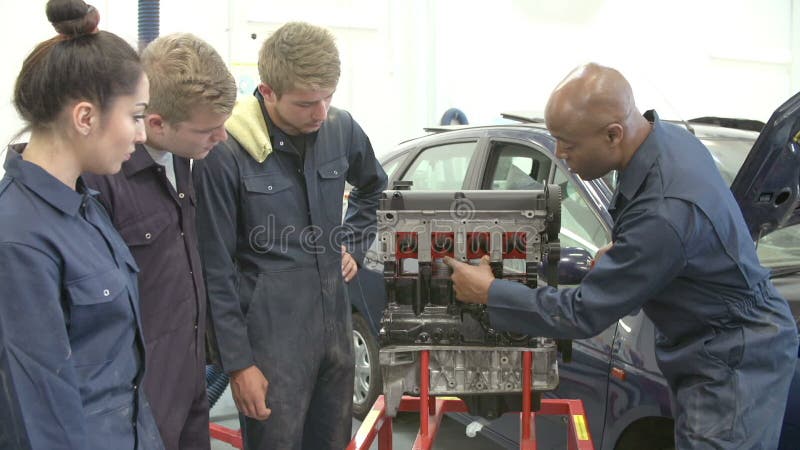 Teacher in Car Mechanic Class Demonstrating How Engine Works Stock ...