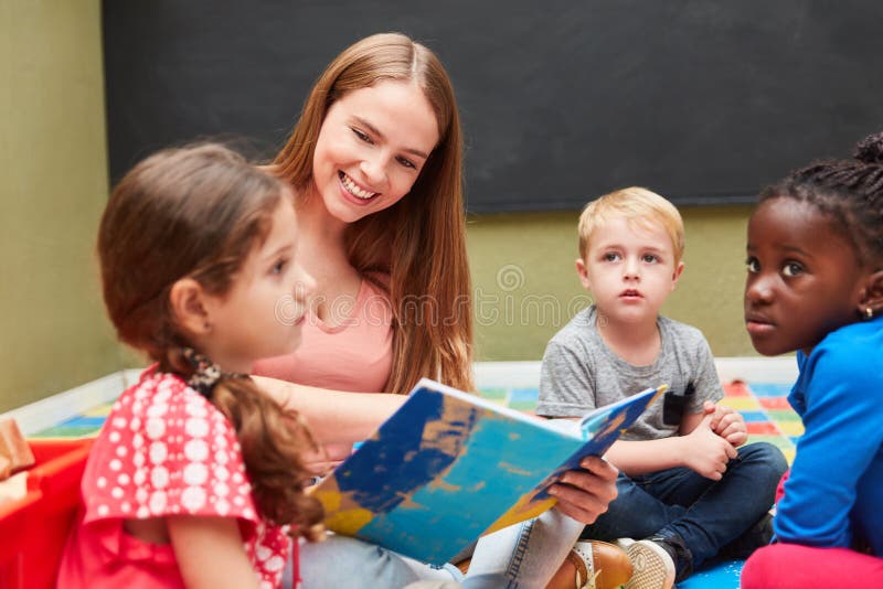 Teacher and Children Reading Aloud Stock Photo - Image of care, listen ...