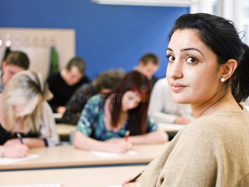 Teacher in classroom stock image. Image of people, study - 28060465