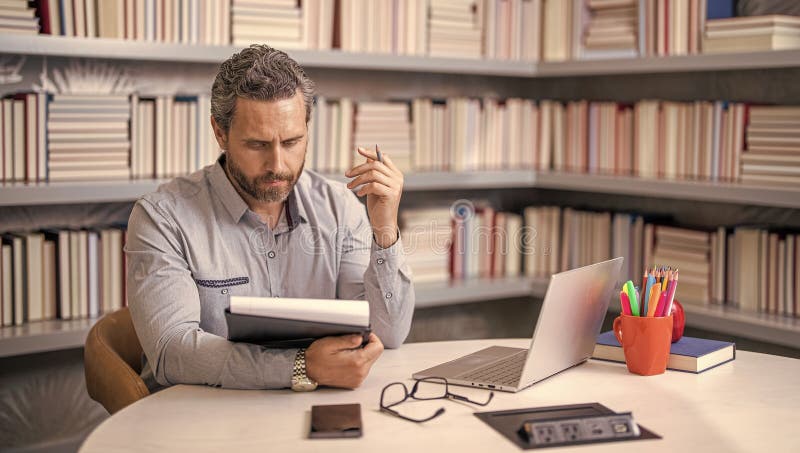 Teacher in Classroom. Man Teacher Study at Workplace. Teachers from ...