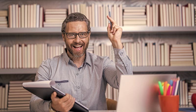 Teacher in Classroom. School Tutor with Book in Classroom. Man on Lesson in Class. Teachers Day ...