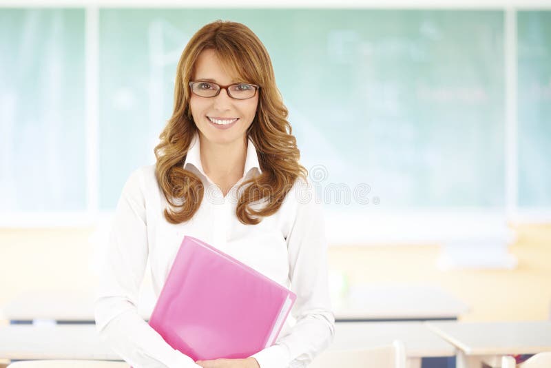Teacher in the classroom stock image. Image of person - 91740067