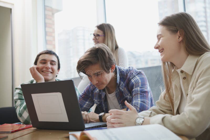 Teacher with College Students in Class Stock Photo - Image of laptop ...
