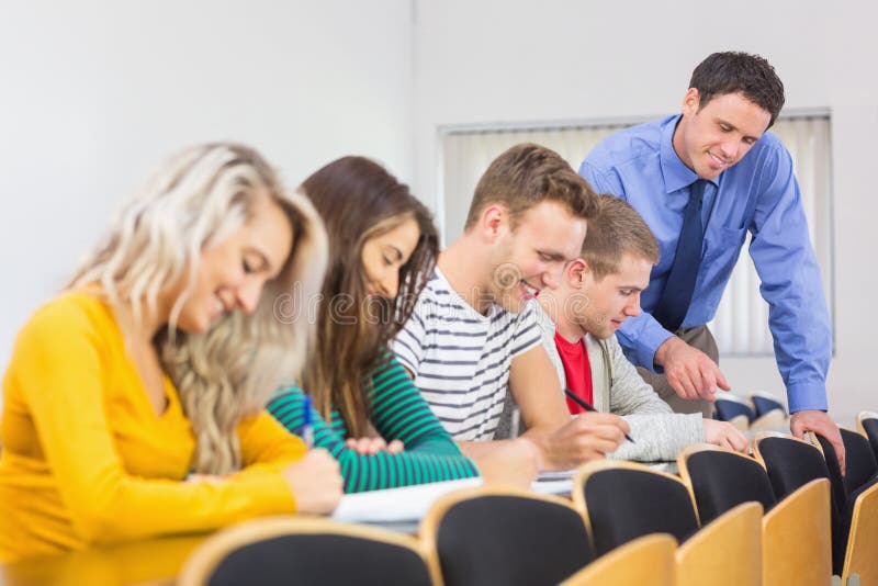 Teacher with College Students at the Classroom Stock Image - Image of ...