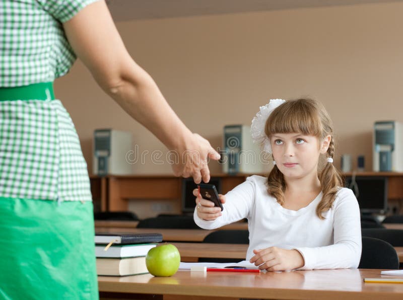 Teacher Is Confiscating Mobile Phone At Lesson Stock Image - Image of ...