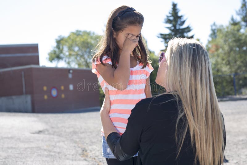 Teacher Consoling a Girl on Schoolyards Stock Photo - Image of problem ...