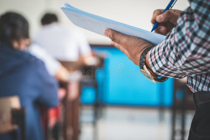 The Teacher Controls the Exam Room for Students To Take the Exam in the ...