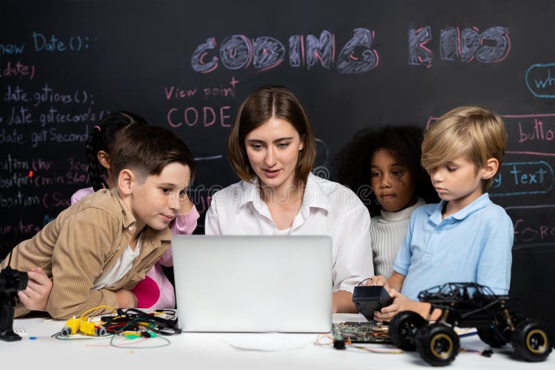 Teacher Demonstrate Attentive Children To Code Robots in STEM Class ...