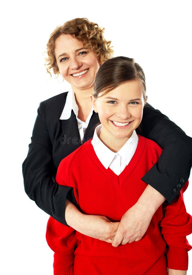 Teacher Embracing Her Student from Back Stock Photo - Image of educate ...