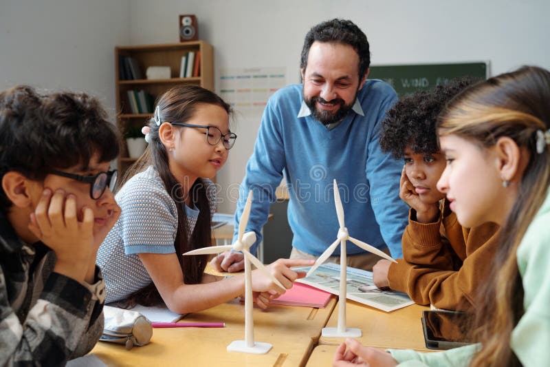 Teacher Engaging Students with Science Project Stock Photo - Image of ...