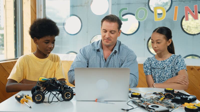Teacher Explain by Using Laptop with Car Model and Board on Table ...