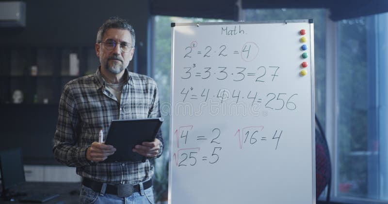 Teacher Explaining Math To Camera Stock Image - Image of homework ...