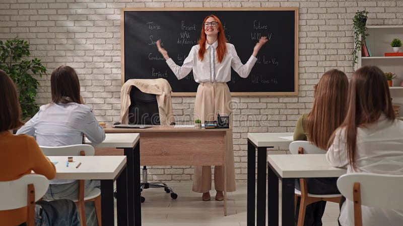 Teacher Explaining Tenses in a Classroom Setting Stock Video - Video of ...