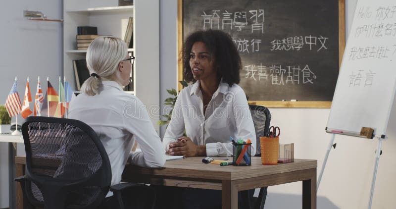 Teacher Explaining To Student in the Classroom Stock Footage - Video of ...