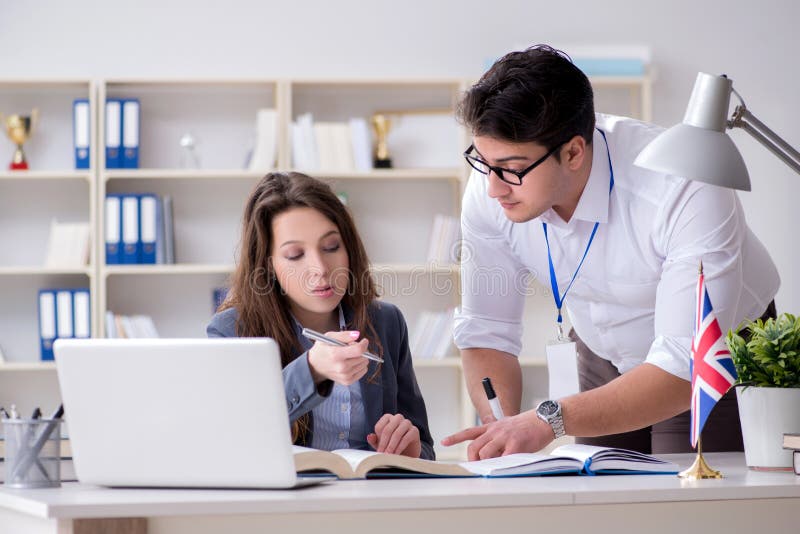 The Teacher Explaining To Student at Language Training Stock Image ...