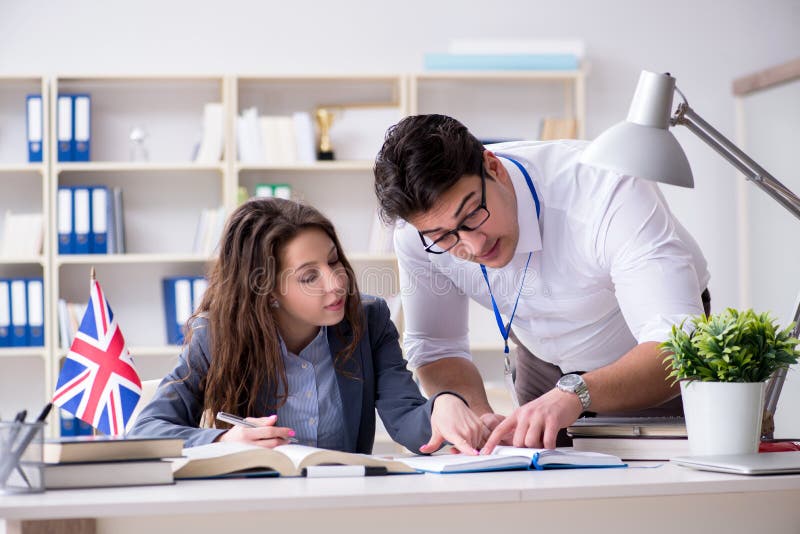 The Teacher Explaining To Student at Language Training Stock Image ...
