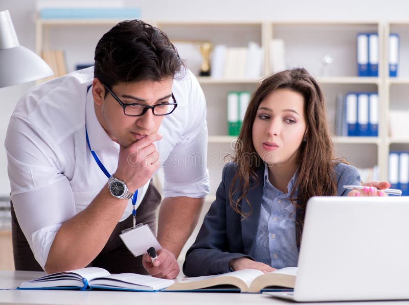 Teacher Explaining To Student at Lecture Stock Photo - Image of online ...