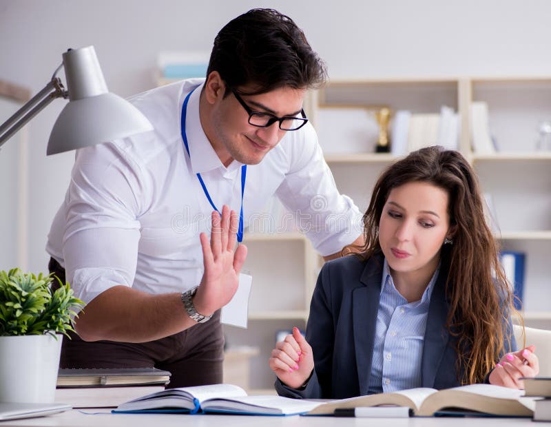 Teacher Explaining To Student at Lecture Stock Image - Image of proctor, girl: 279971907
