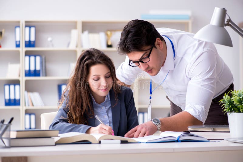 The Teacher Explaining To Student at Lecture Stock Image - Image of ...